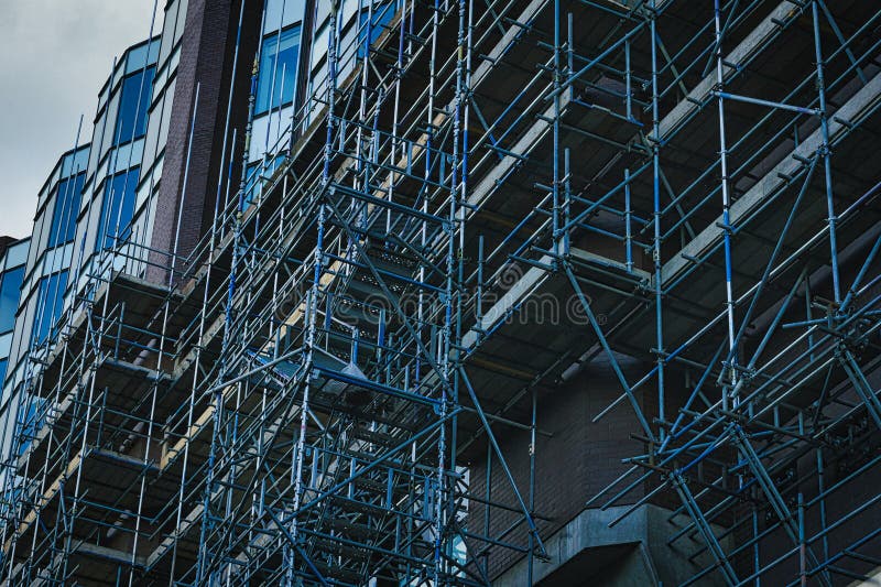 Complex Network of Metal Scaffolding on the Exterior of a Modern ...