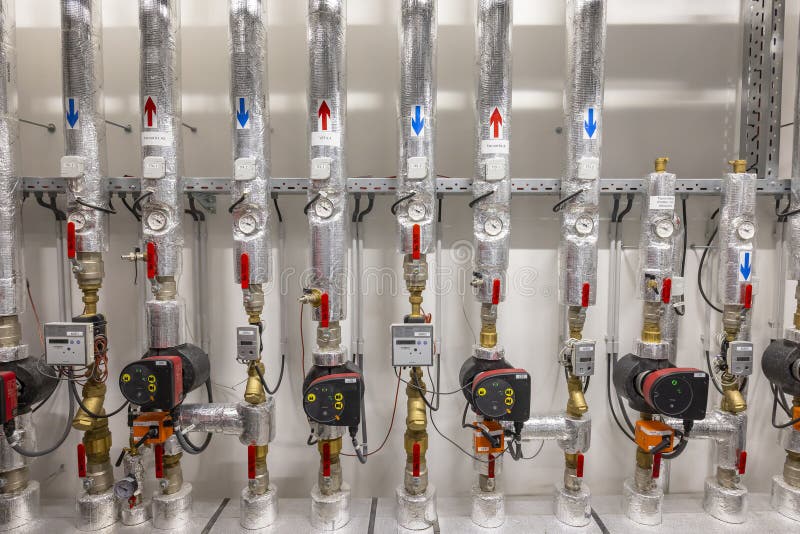 Heating System Pipes and Pumps Showing Flow Direction in a Modern ...