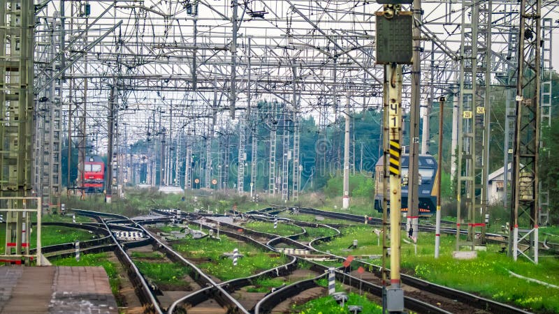 A Complex Railway Junction Featuring Tracks, Overhead Infrastructure ...