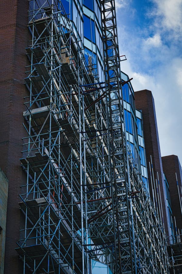 Complex Scaffolding Structure on the Side of a Modern Building with ...