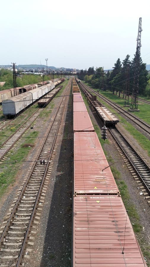 A Complex System of Railway Tracks and Wagons, Intertwined with ...
