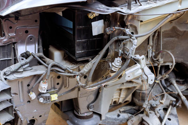 Vehicle Electrical System with Exposed Wiring Components in Workshop ...