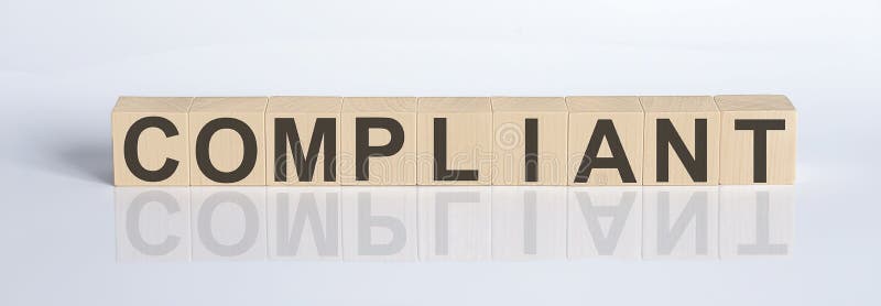 COMPLIANT Word from Wooden Blocks on the White Desk Stock Image - Image ...