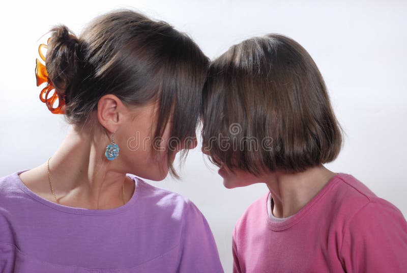 Complicity between sisters stock image. Image of sisters - 147892239