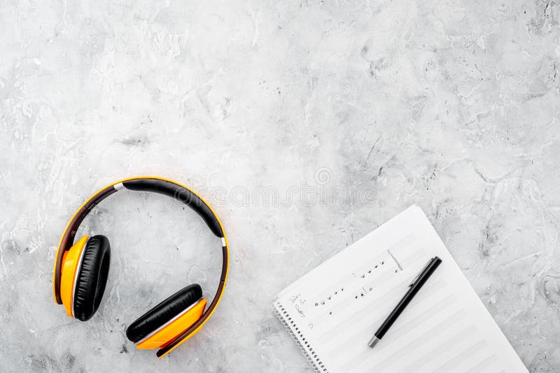 Composer and Song Writer Desktop with Headphones and Notes on Stone ...