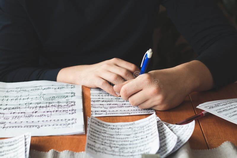Composer writing music stock photo. Image of interior - 212355234