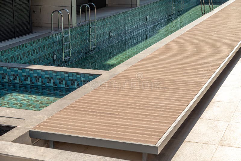 Composite Deck Installed on the Edge of the Swimming Pool Stock Photo ...