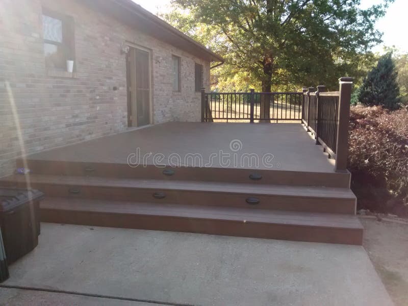 Composite Deck with Pecan Decking and Mocha Railing Stock Photo - Image ...