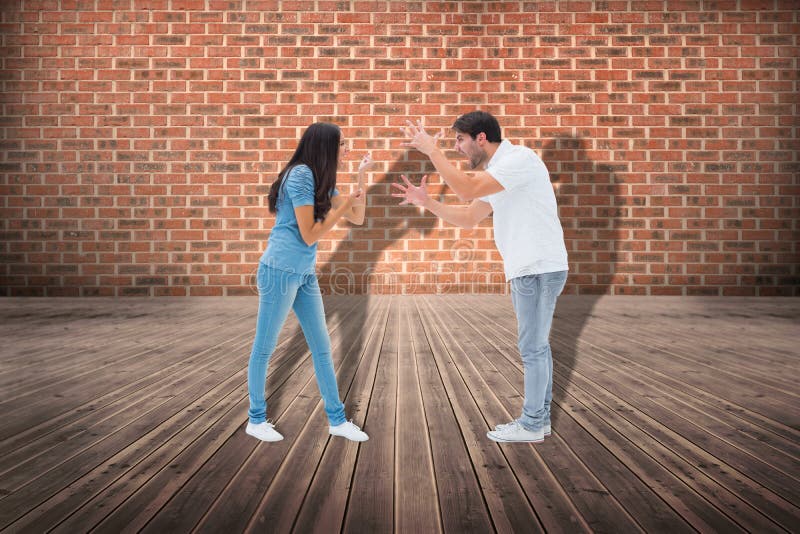 Composite Image of Angry Couple Shouting at Each Other Stock Image ...