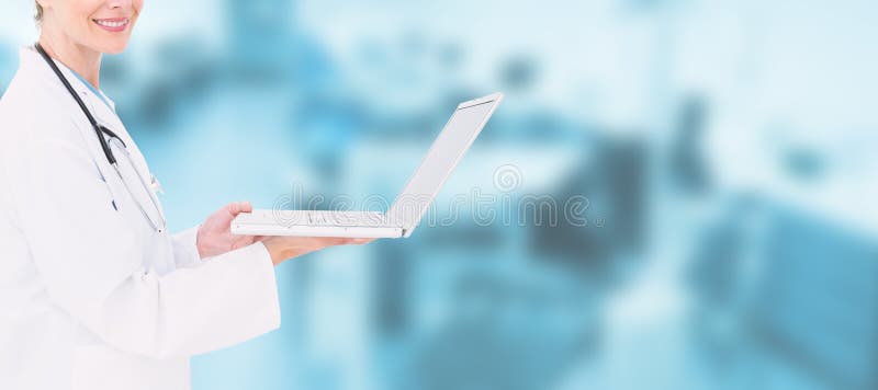 Composite Image of Blonde Doctor Using Laptop Stock Photo - Image of ...