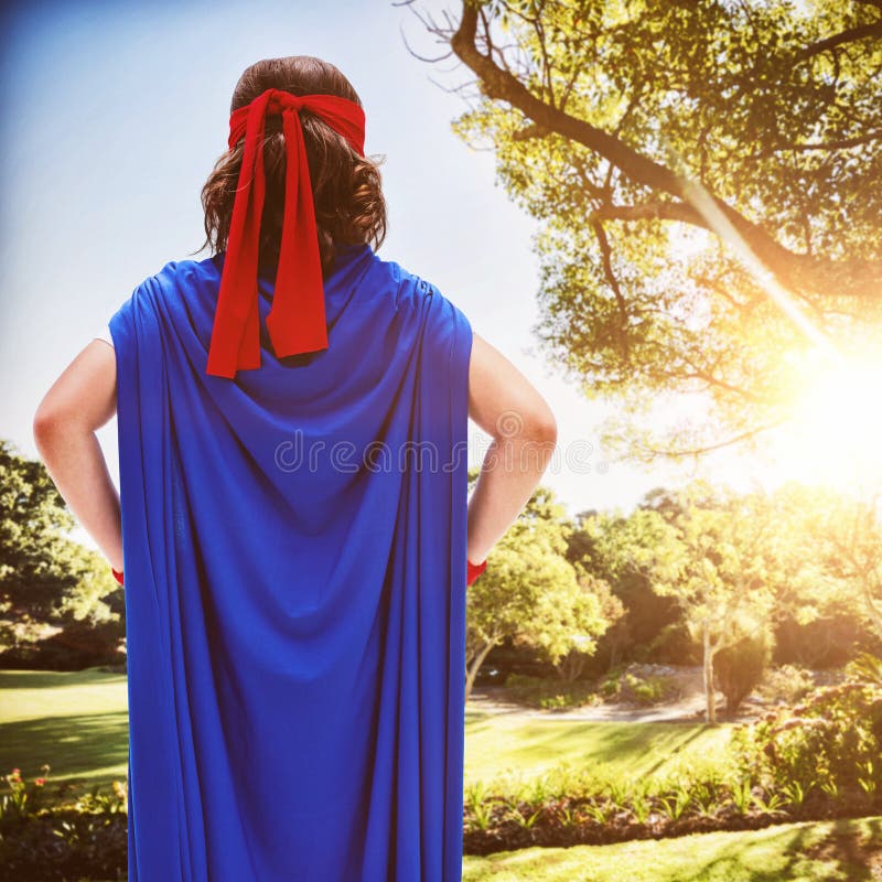 Composite Image of Boy in Blue Cape Standing Stock Image - Image of ...