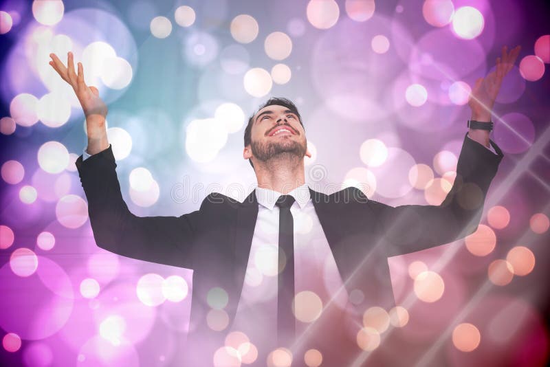 Composite Image of Businessman Cheering with Hands Raised Stock Image ...
