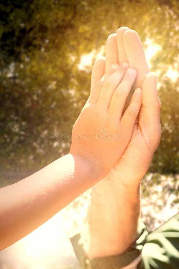 Composite Image of Close-up of Hand Giving High Five Stock Image ...