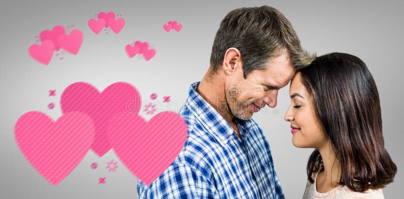 Composite Image of Close-up of Romantic Couple Standing Face To Face ...