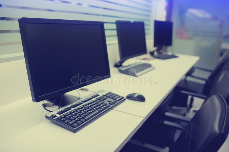 Composite Image of Computer in Office or Training Room Stock Photo ...