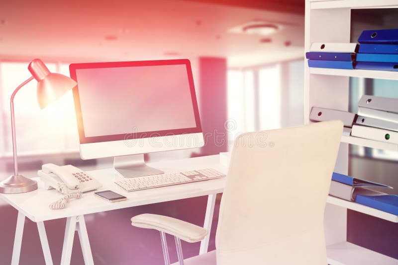 Composite Image of Computer with Telephone and Mobile Phone at Desk ...