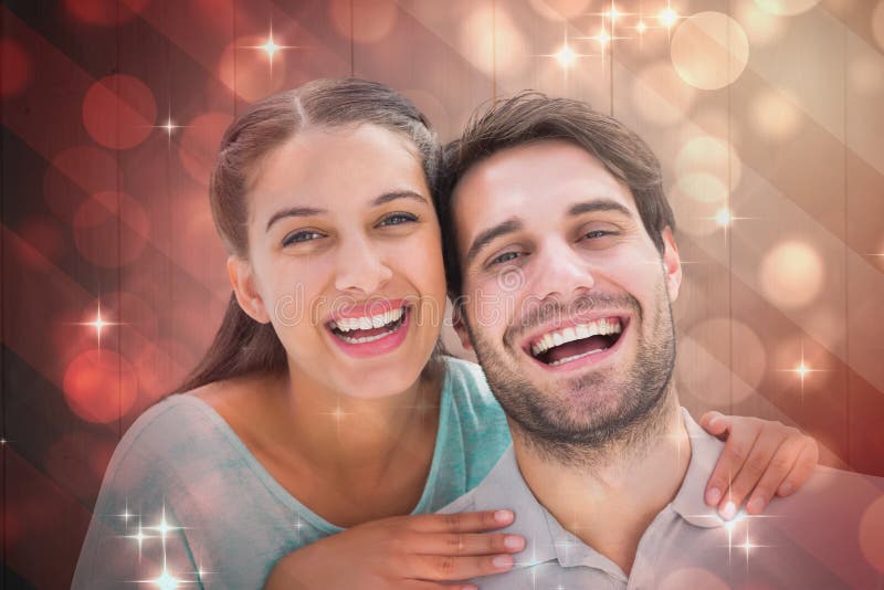 Composite Image of Cute Couple Smiling at Camera Stock Image - Image of ...