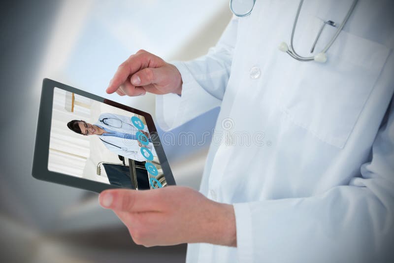 Composite Image of Doctor Using Digital Tablet Stock Photo - Image of ...