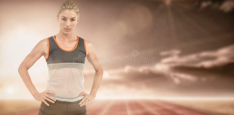 Composite Image of Female Athlete Standing with Hand on Hip Stock Photo ...