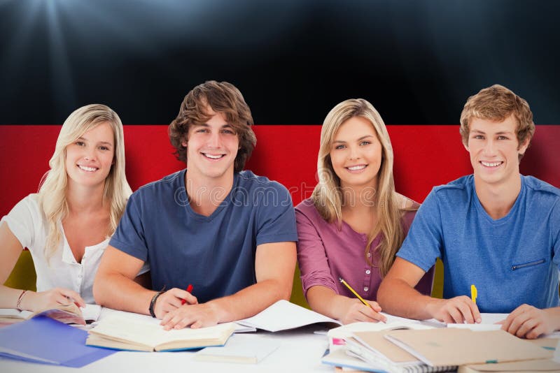 Composite Image of Four Students Looking at the Camera Stock Photo ...