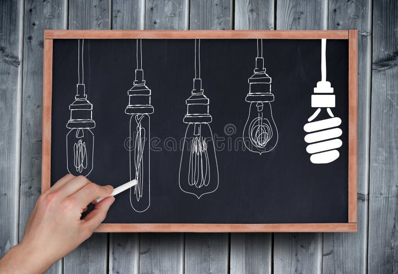 Composite Image of Hand Drawing Light Bulbs with Chalk Stock Photo ...