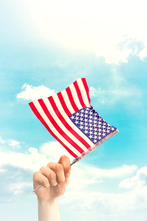 Composite Image of Hand Waving American Flag Stock Photo - Image of ...