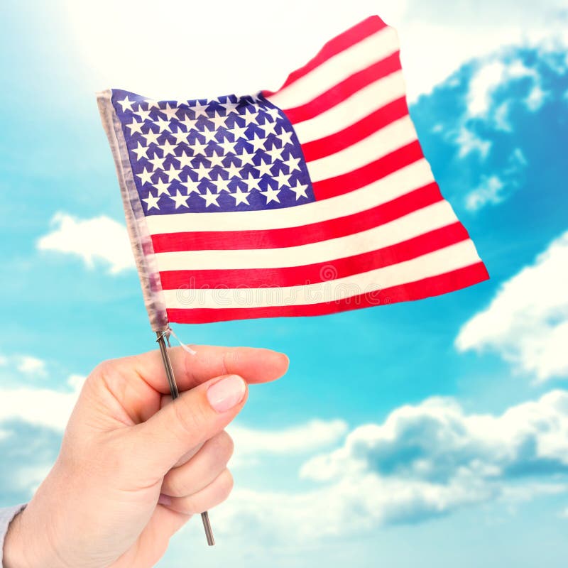 Composite Image of Hand Waving American Flag Stock Photo - Image of ...