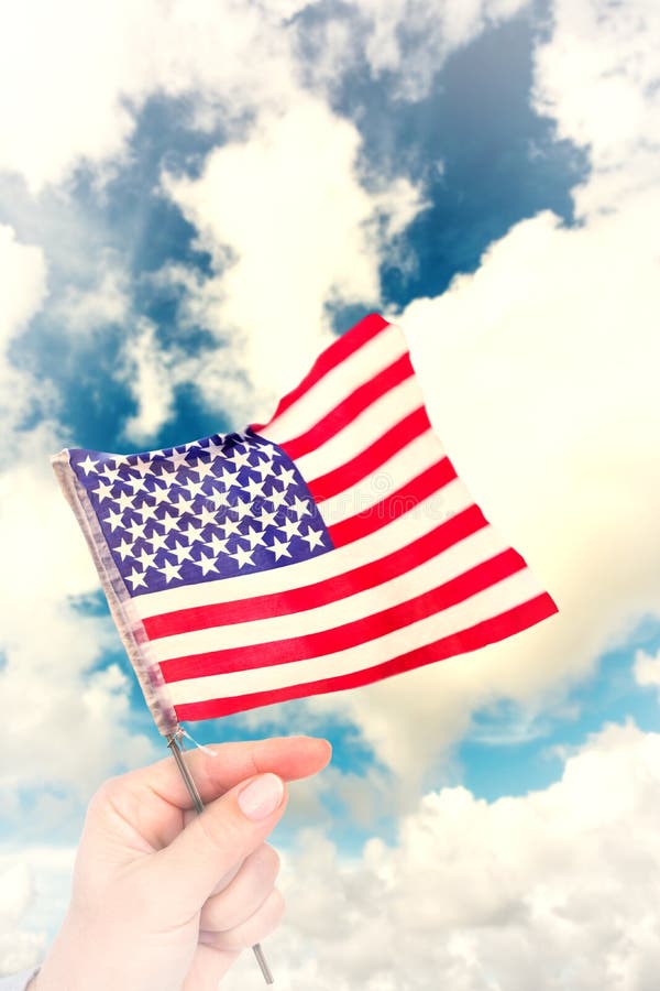 Composite Image of Hand Waving American Flag Stock Image - Image of ...