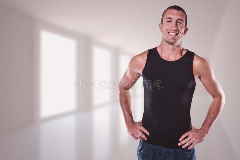 Composite Image of Happy Athlete with Hands on Hip Standing Stock Photo ...