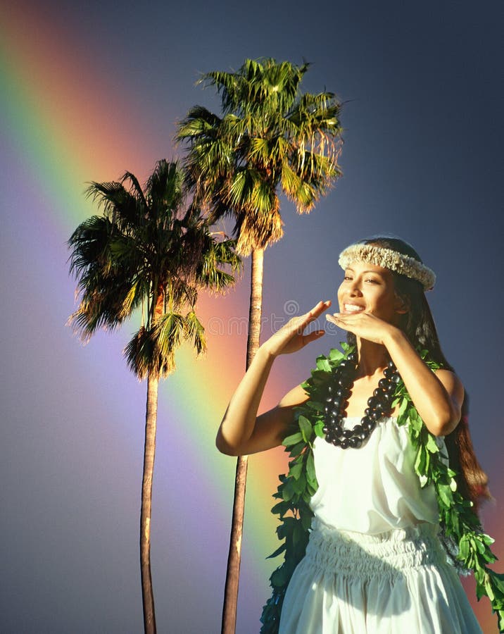 Composite Image of Hawaiian Native Dancer, Palm Trees and Rainbow in ...