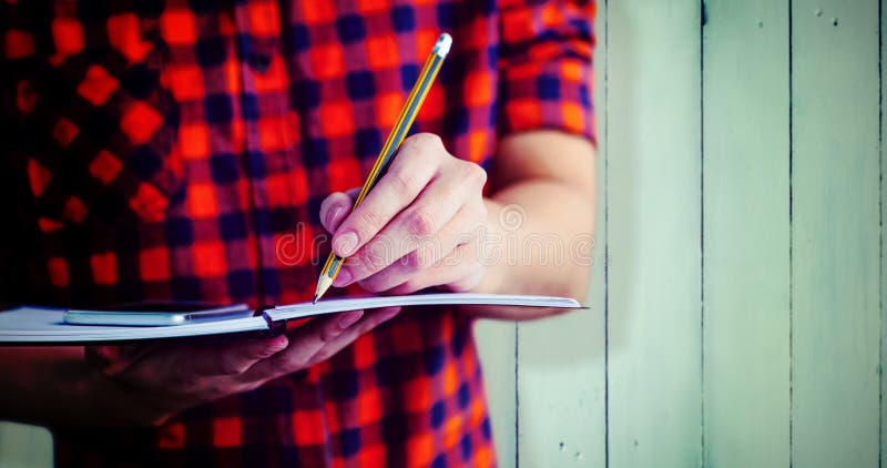 Composite Image of Hipster Taking Notes on Notebooks Stock Image ...