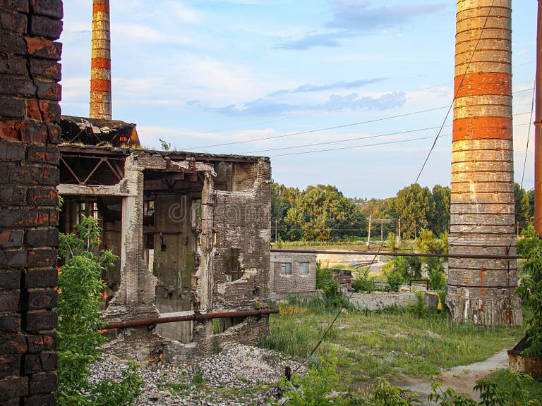 A Composite Image of an Industrial Building in Decline, Shown from ...