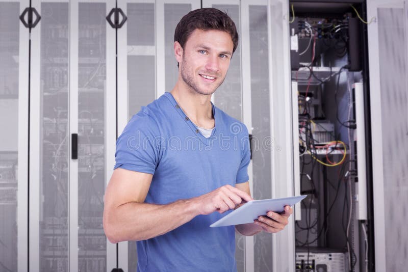 Composite Image of Man Scrolling through Tablet Pc Stock Image - Image ...