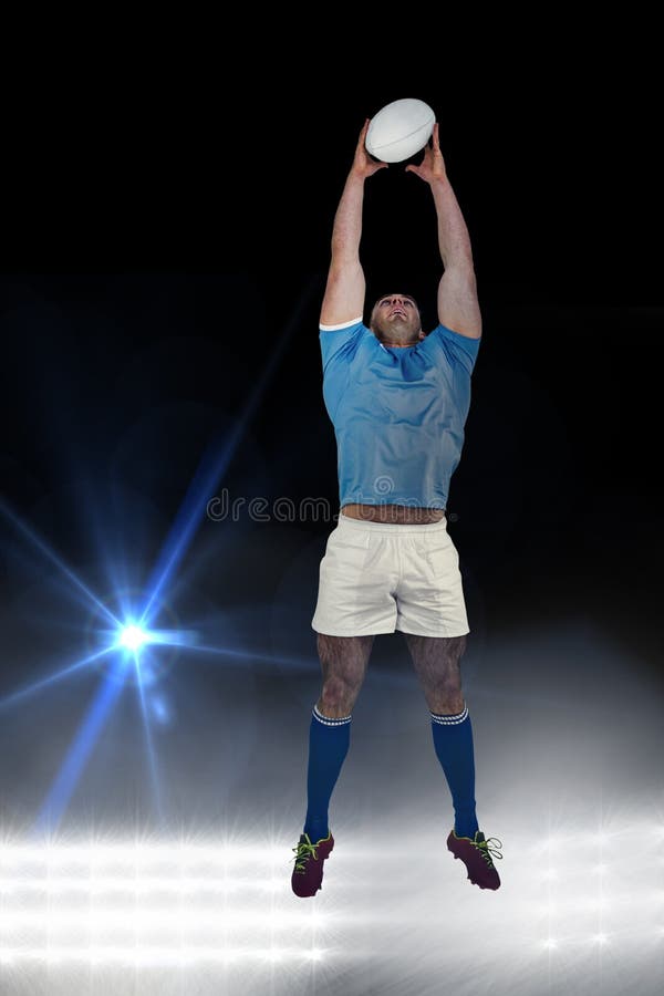 Composite Image of Rugby Player Catching the Ball Stock Photo - Image ...