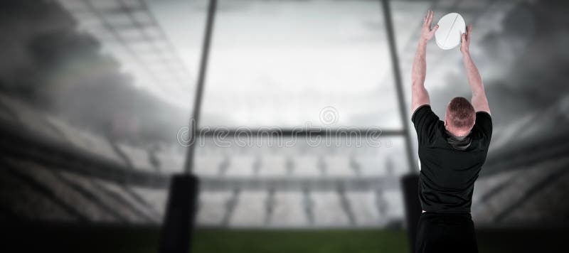 Composite Image of Rugby Player Catching a Rugby Ball Stock Photo ...