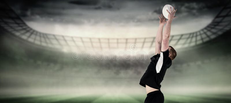 Composite Image of Rugby Player Catching a Rugby Ball Stock Photo ...