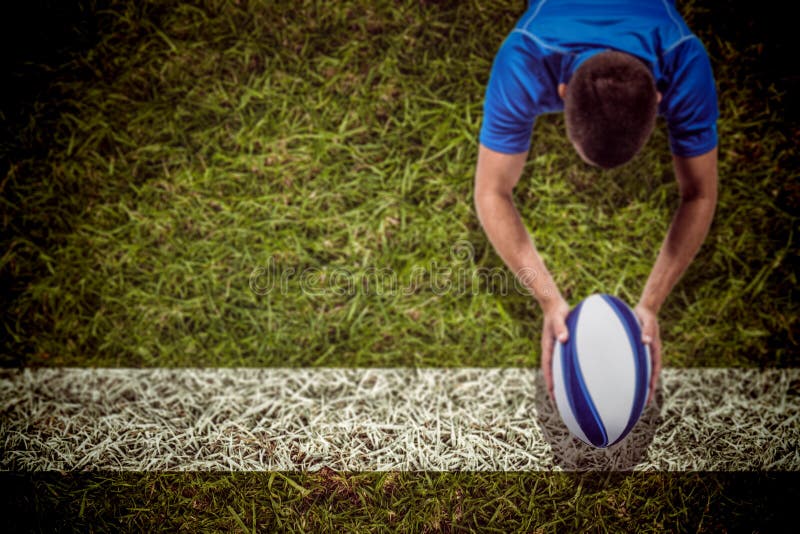 Composite Image of Rugby Player Lying in Front with Ball Stock Image ...
