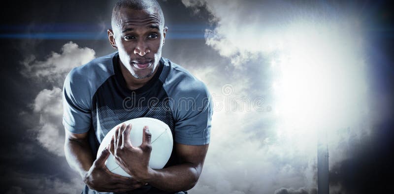 Composite Image of Rugby Player Smiling while Catching Ball Stock Image ...