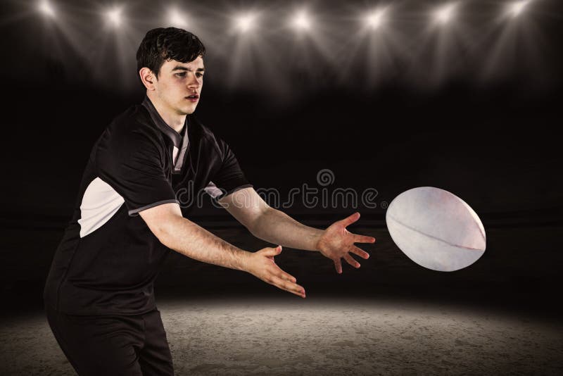 Composite Image of Rugby Player Throwing a Rugby Ball Stock Image ...