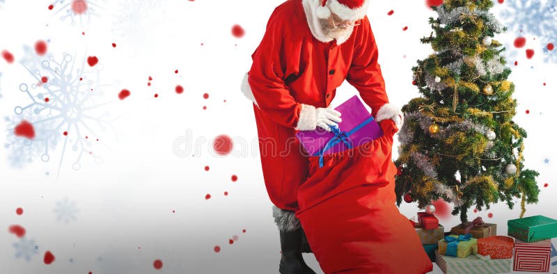 Composite Image of Santa Claus Packing Christmas Bag Stock Image ...