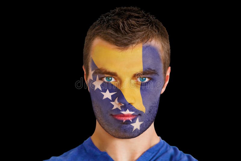 Composite Image of Serious Young Bosnian Fan with Facepaint Stock Image ...