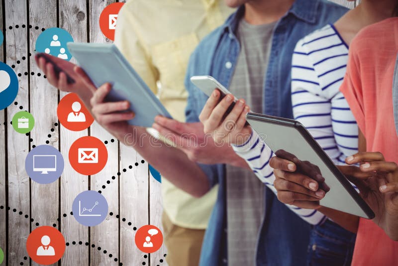 Composite Image of Smiling Creative Team Standing in a Line Using ...