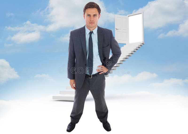 Composite Image of Stern Businessman Standing with Hand on Hip Stock ...