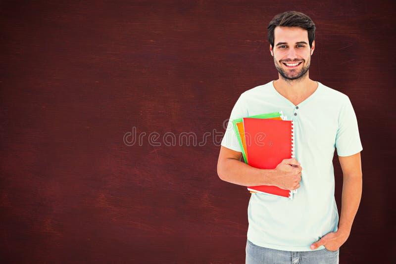 Composite Image of Student Holding Notepad Stock Image - Image of table ...