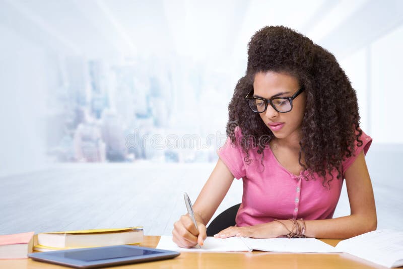 Composite Image of Student Sitting in Library Writing Stock Image ...