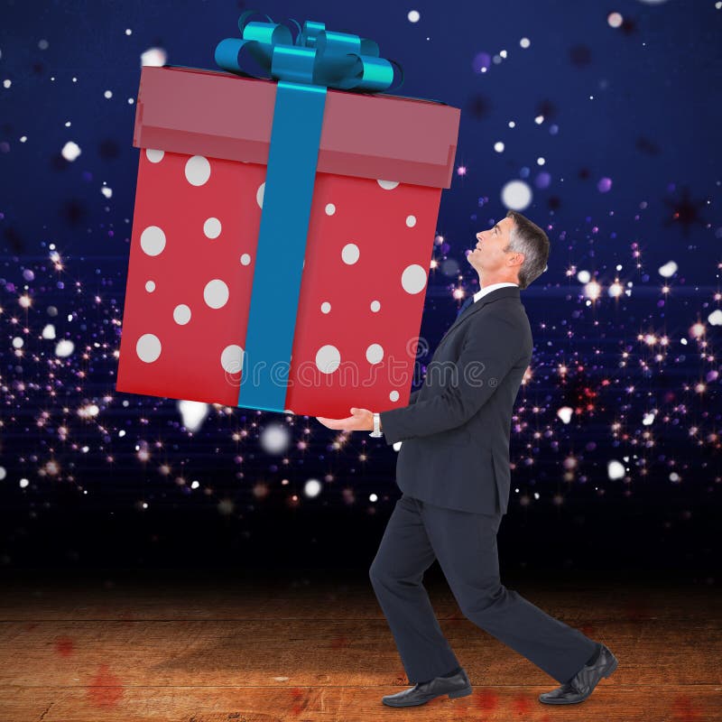 Composite Image of Stylish Man with Giant Gift Stock Photo - Image of ...