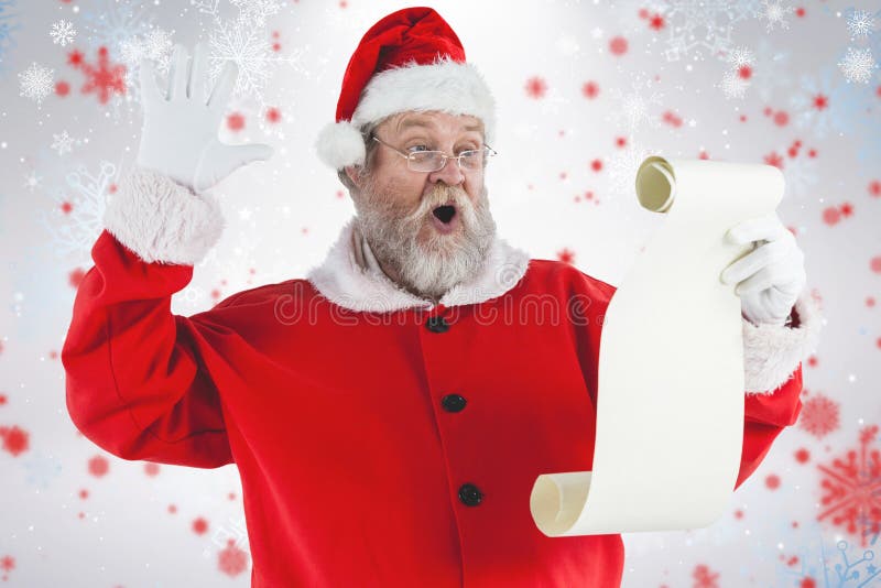 Composite Image of Surprised Santa Claus Making Face while Reading ...