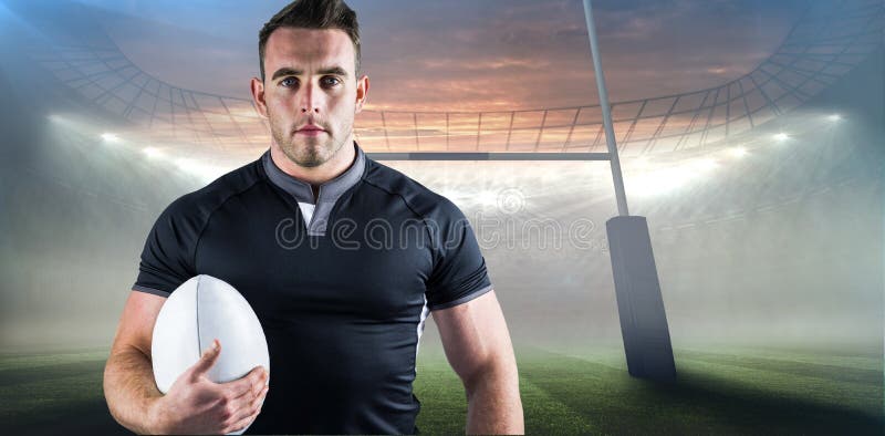 Composite Image of Tough Rugby Player Holding Ball Stock Photo - Image ...