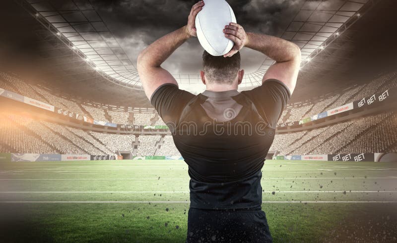 Composite Image of Tough Rugby Player Throwing Ball Stock Photo - Image ...