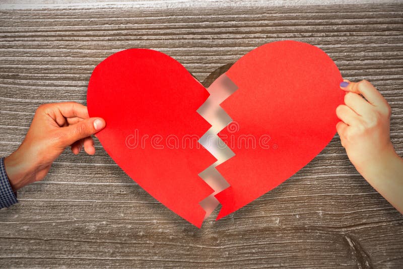 Composite Image of Two Hands Holding Broken Heart Stock Image - Image ...
